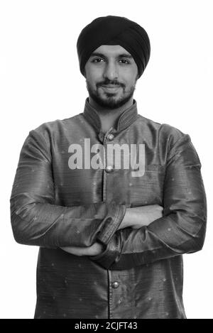 Portrait of an elegant Sikh man with black turban, beard and mustache ...