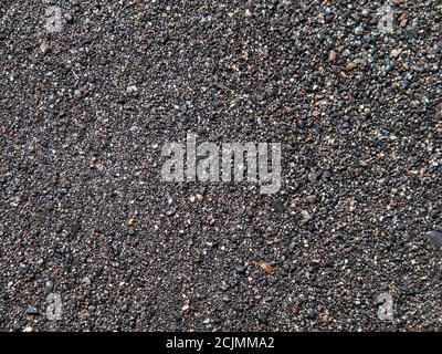 Coarse sand grains and small pebbles, finely ground minerals on an ...