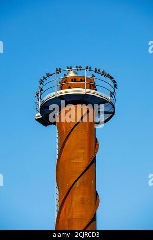 Helical strakes or corkscrew fin at the top of a district heating power ...