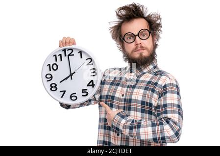 Crazy bearded man with big clock Stock Photo - Alamy