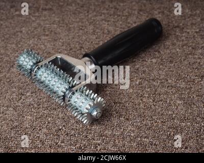 carpet installation tool. comb and trim carpet, tool isolated Stock ...