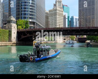 Chicago Police Department Marine Unit Officer Mark Walsh, left ...