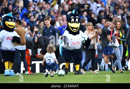 Tottenham Hotspur club mascot Chirpy Cockerel (centre) and the Chelsea ...