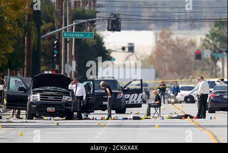 Investigators working at crime scene in messy room Stock Photo - Alamy