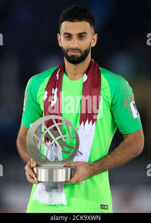 Qatar's goalkeeper Saad Al Sheeb challenges Ecuador's Enner Valencia ...