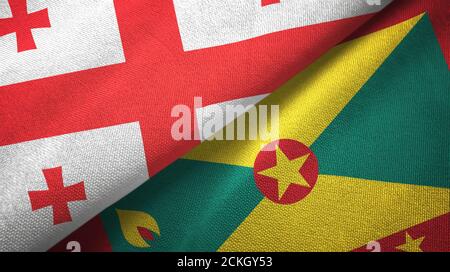 Grenada and Georgia two flags textile cloth, fabric texture Stock Photo ...