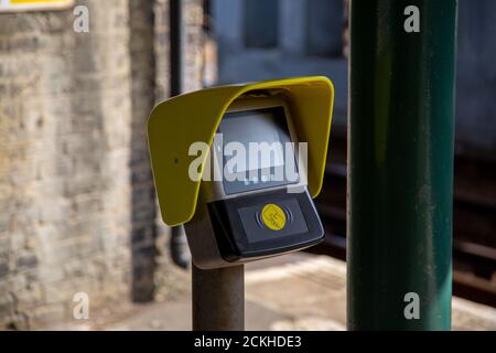 A ticket or travel card scanner point on a train station platform Stock ...