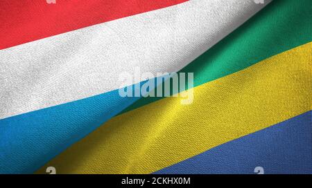 Gabon and Luxembourg two flags textile cloth, fabric texture Stock ...