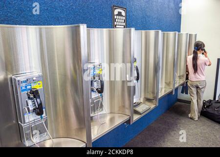 People using public pay phones in Los Angeles, California, 1984 Stock ...