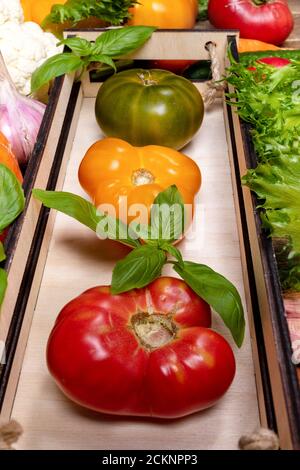 Close perspective of organic raw red pork ribs on clean wooden surface ...