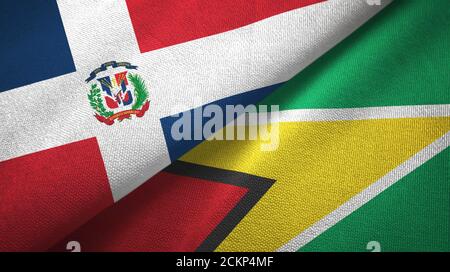 Guyana and Dominican Republic two flags textile cloth, fabric texture ...