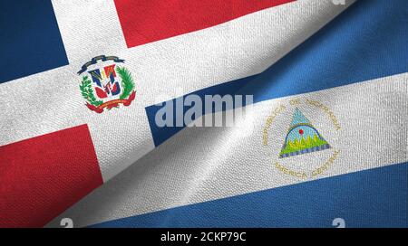 Nicaragua and Dominican Republic two flags textile cloth, fabric ...