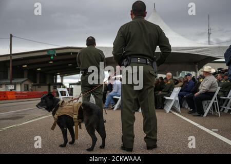 armed border patrol with dog Stock Photo - Alamy