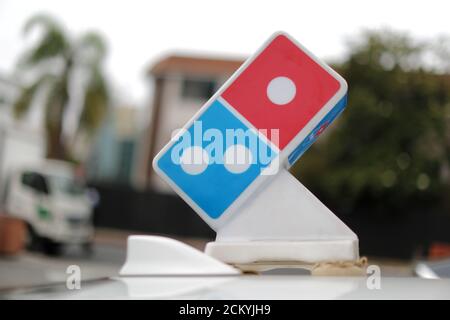 Domino's pizza delivery car sign - USA Stock Photo - Alamy