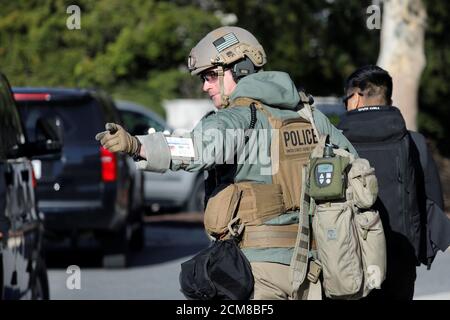 Member of U.S. Secret Service HAMMER team wait outside the room while ...