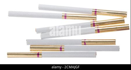 Bunch of unlit cigarettes isolated on white Stock Photo - Alamy