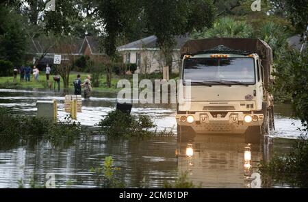 Soldiers from Bravo Troop, 1-153 CAV, 53rd IBCT, assist residents of ...