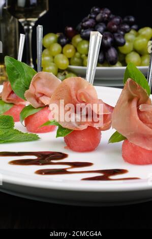 Food, Canape of watermelon balls with a melon with gammon and salami ...