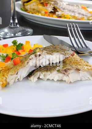 Slices of baked fish Dorado Stock Photo - Alamy