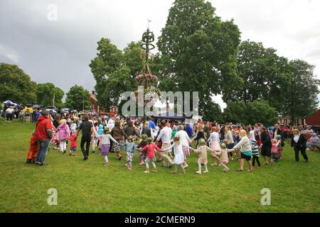 People dancing around midsummer maypole Stock Photo - Alamy