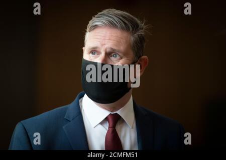 Sir Keir Starmer wearing a mask, leaves LBC's radio studio in Leicester ...