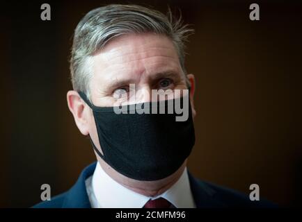 Sir Keir Starmer wearing a mask, leaves LBC's radio studio in Leicester ...