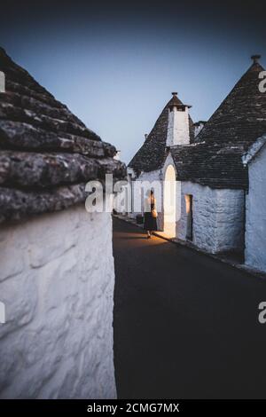 ITALY, PUGLIA, ALBEROBELLO: Street views of the trulli of Alberobello ...