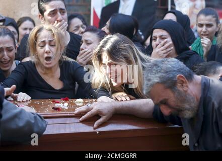 Family members and relatives carrying dead bodies of a Nepalese migrant ...