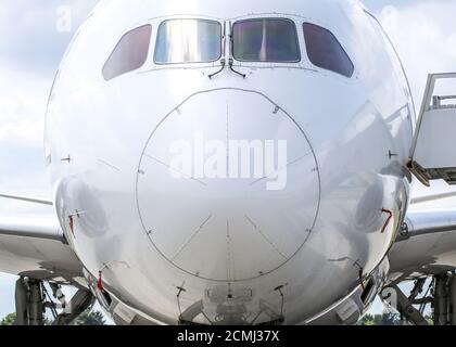 View of the nose and cockpit window of a Boeing 747 at the airport of ...