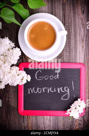coffee and chalk board on a table Stock Photo - Alamy