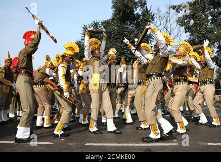 Members of the Central Industrial Security Force (CISF) celebrate after ...