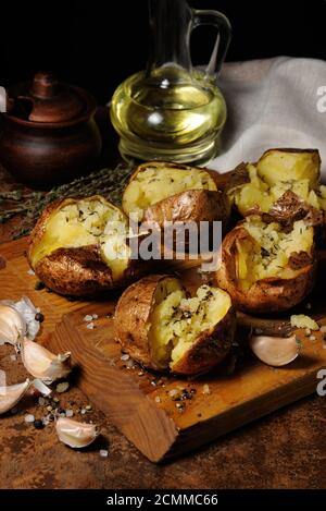 With broken potato dish Stock Photo - Alamy
