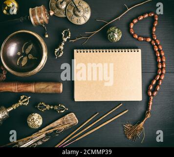 Asian religious musical instruments for meditation and notebook Stock ...