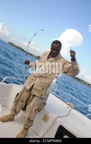 Joint military fishing trip 110708 Stock Photo - Alamy