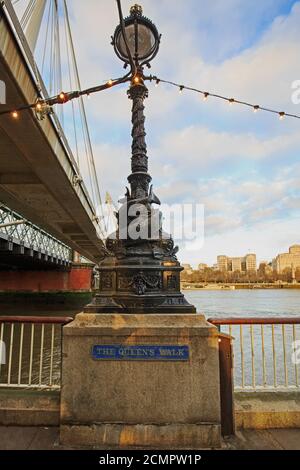 Dolphin lamp standards on the Embankment by Waterloo Bridge, Southbank ...