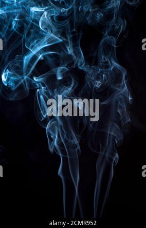 Beautiful smoke on the black background - macro photo Stock Photo - Alamy