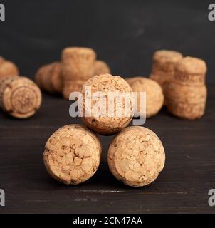 corks of champagne on vintage wooden board alcohol concept Stock Photo ...