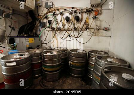 Beer kegs in the cellar of a pub Stock Photo - Alamy