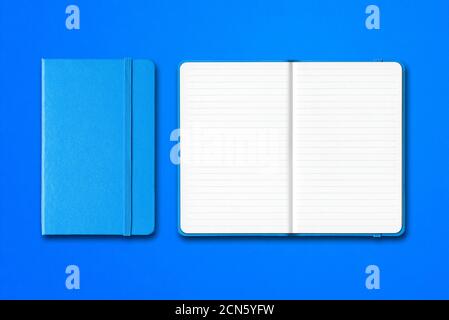 Cyan open lined notebook mockup isolated on blue background. Horizontal ...