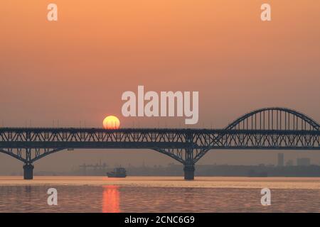 railway and highway combined bridge in sunrise Stock Photo - Alamy