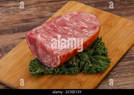 Tasty Beef ham piece over board Stock Photo - Alamy