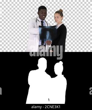 Doctor shows the patient chest x-ray, Alpha Channel Stock Photo - Alamy