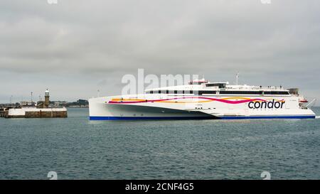 Condor Ferries' trimaran ship, HSC Condor Liberation, enters the harbour at Saint Peter Port ...