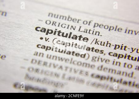 Highlighted word capitulate concept and meaning Stock Photo - Alamy