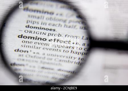 Highlighted word domino effect concept and meaning Stock Photo - Alamy