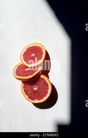 Vertical closeup shot of grapefruit slices Stock Photo - Alamy