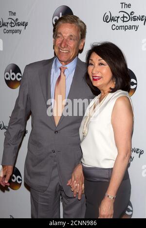 Maury Povich and wife Connie Chung pose for pictures at the Daytime ...