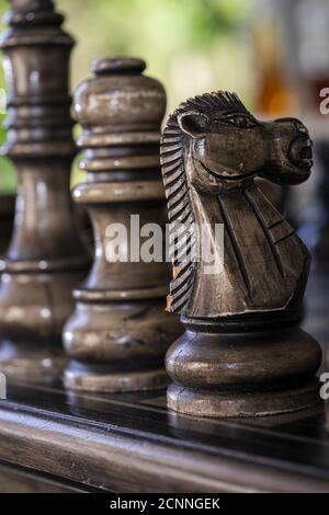 Chess figures on board, puzzle game, difficulty Stock Photo - Alamy