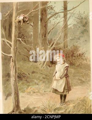 Pictures hung on the walls and other decor inside an alcove of a ...