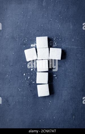Sugar cubes, cross Stock Photo - Alamy